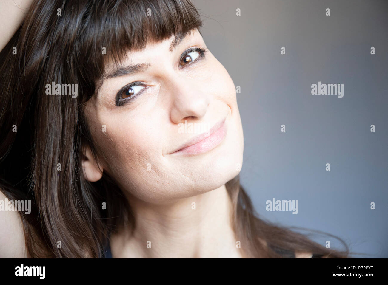 Woman with the head tilted hi-res stock photography and images - Alamy