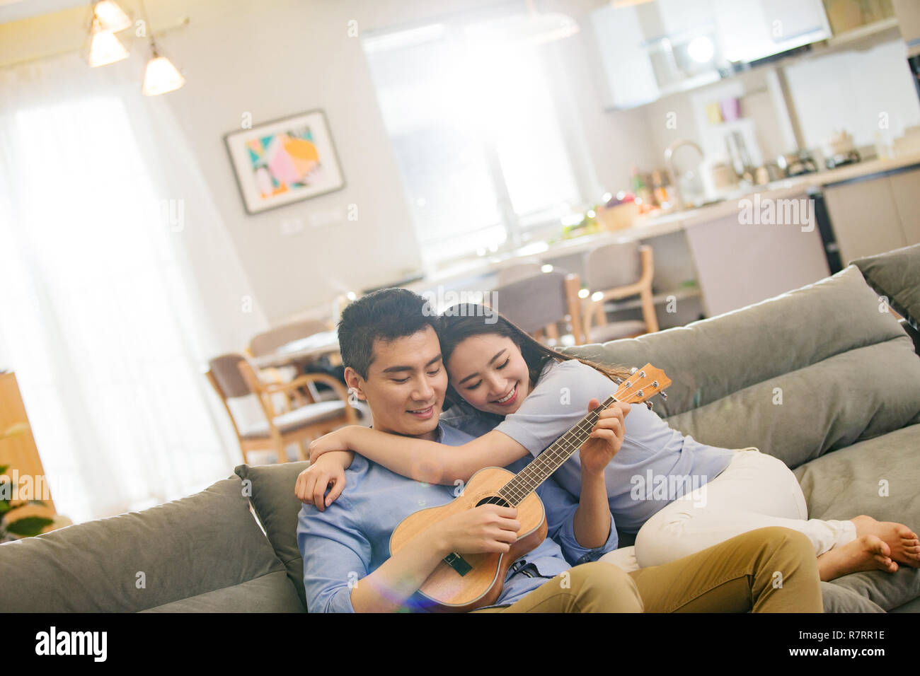 Romantic couples in the living room Stock Photo - Alamy