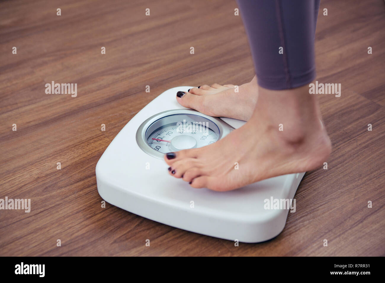 Young indian woman measuring hi-res stock photography and images - Alamy