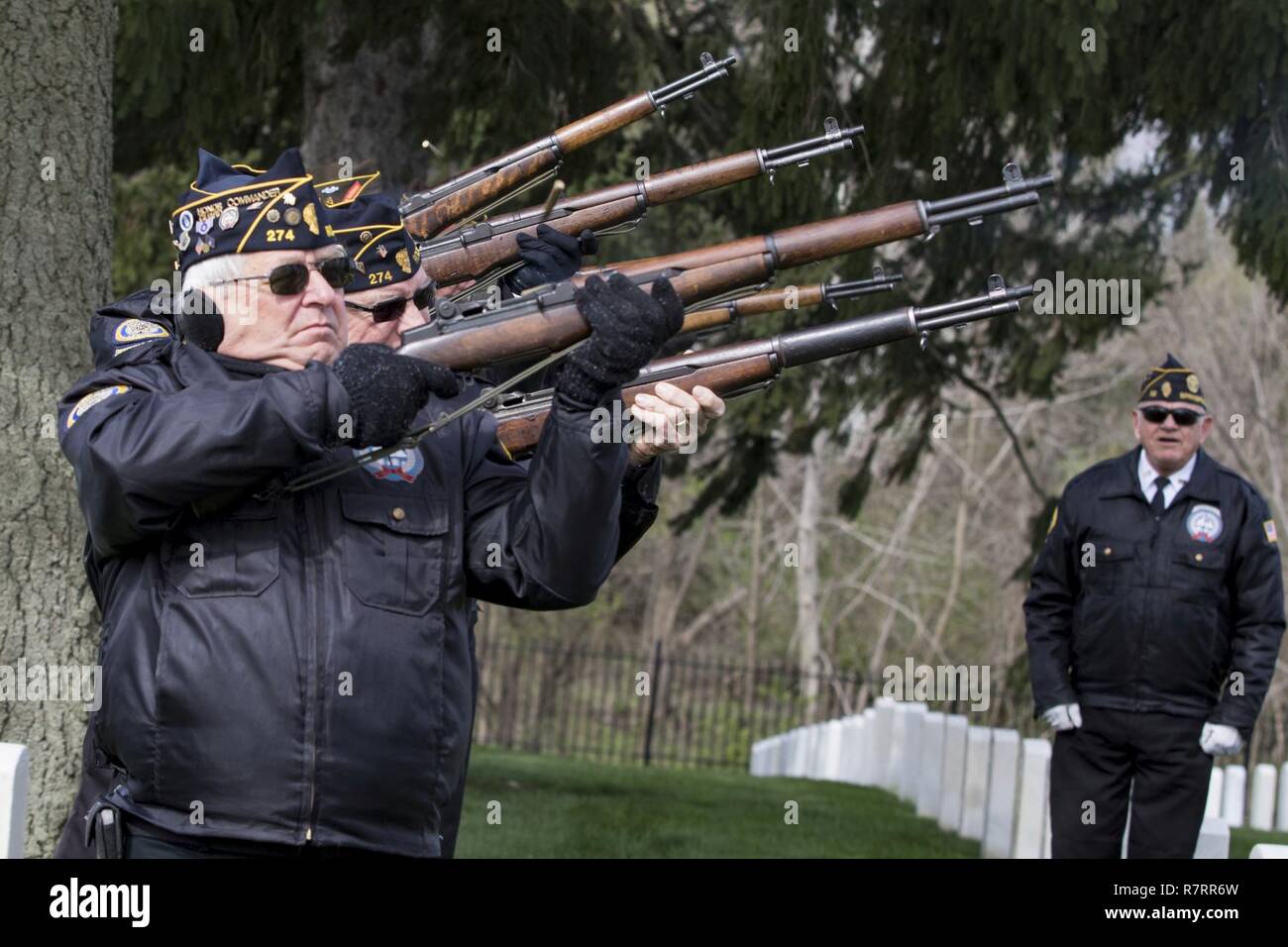 Members of the Italian American War Veterans fire a 21 gun salute ...