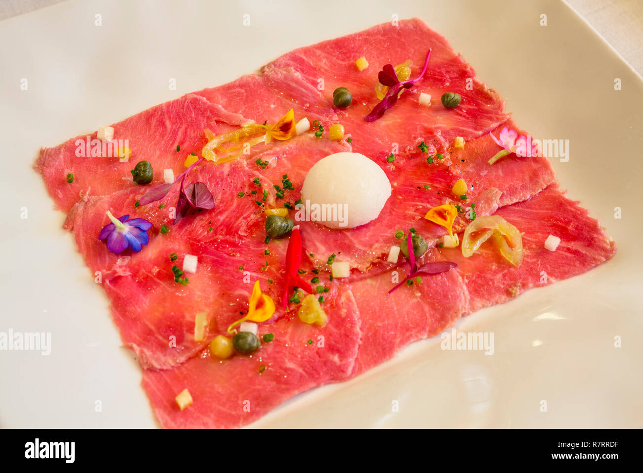 Iberian boar carpaccio with lychees shernet. Submarino Restaurant ...