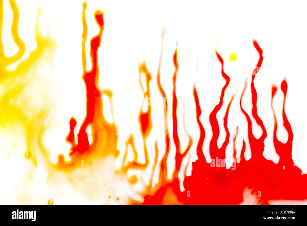 a spot of red paint on a white background. stain and spray Stock Photo ...