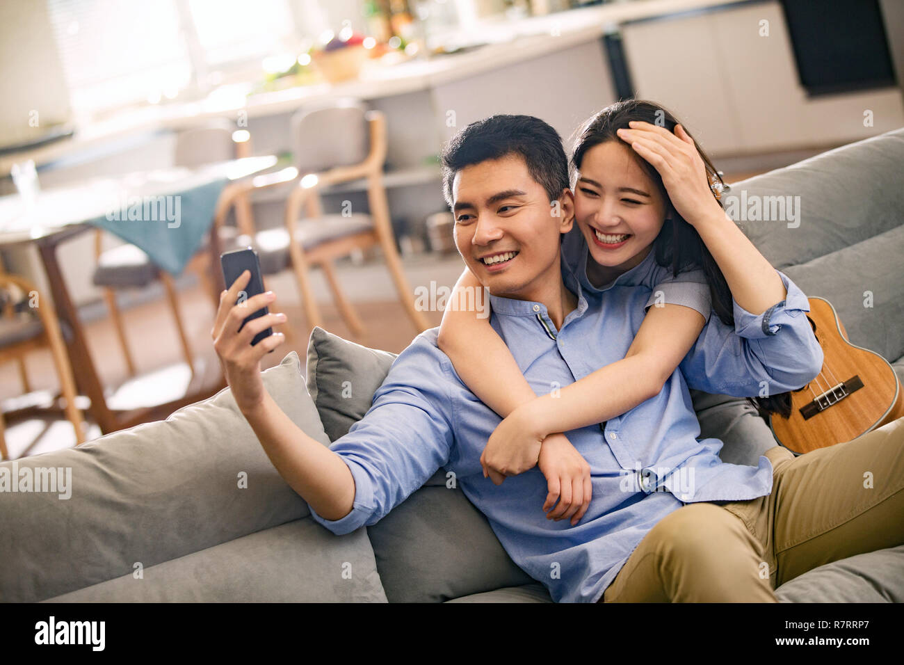 Romantic couples in the living room Stock Photo - Alamy