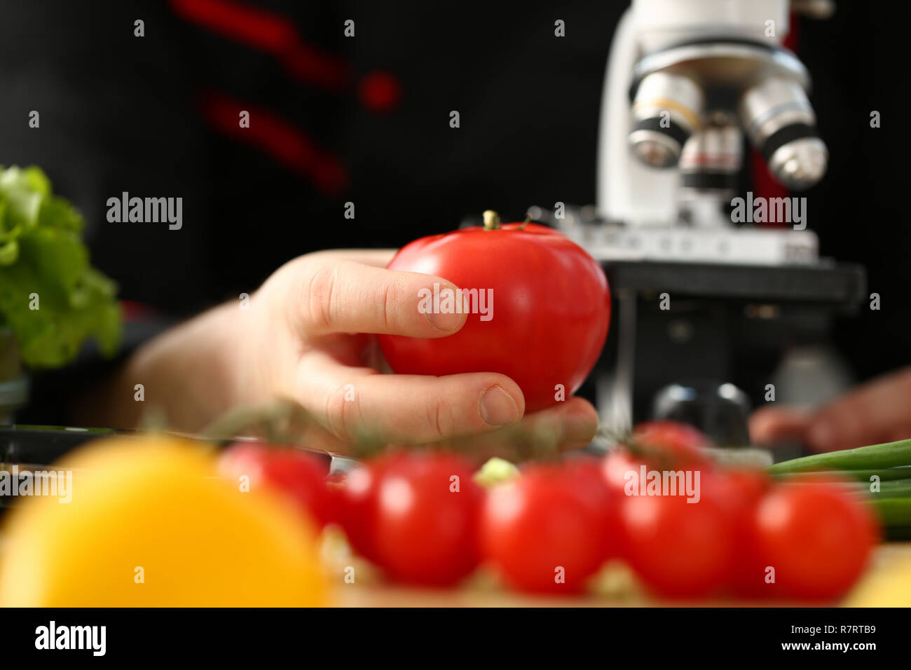 Microscope head on kitchen background Stock Photo - Alamy