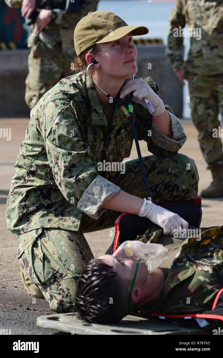 U.S. Coast Guard Petty Officer 2nd Class Liesl Olson, a health service ...