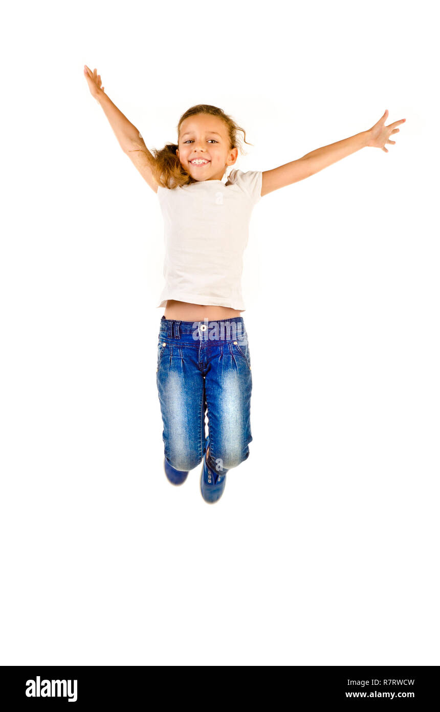 jumping little girl isolated on a white background Stock Photo - Alamy