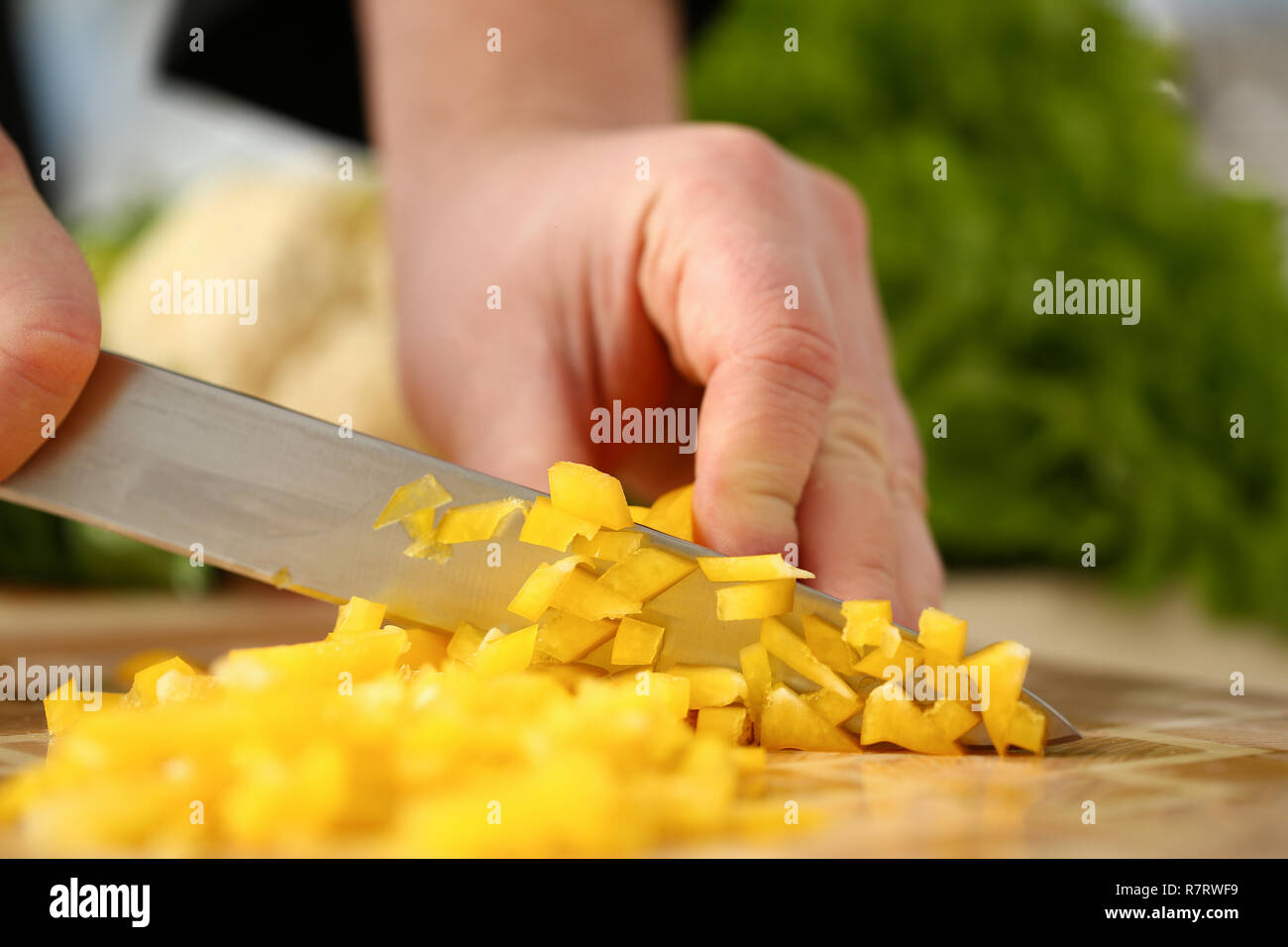 Chef cuts bell pepper knife hi-res stock photography and images - Alamy