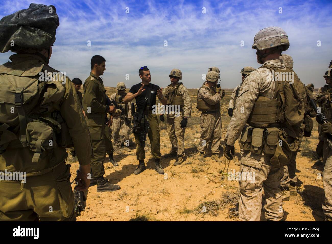 U.S. Marines with Marine Rotational Force Europe 17.1 (MRF-E) listen to ...