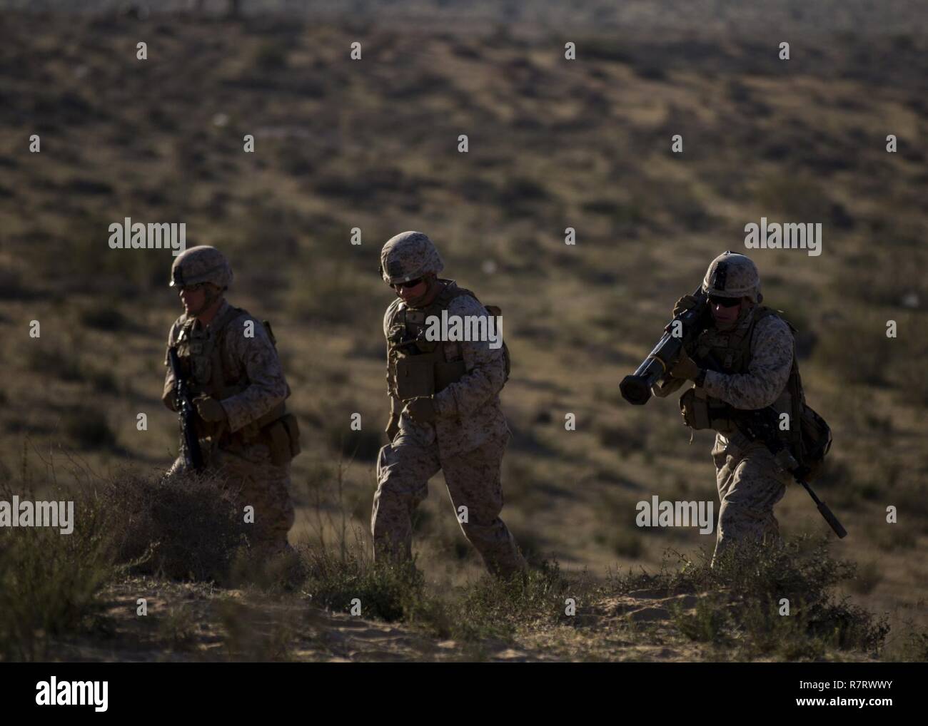 U.S. Marines with Marine Rotational Force Europe 17.1 run with an ...