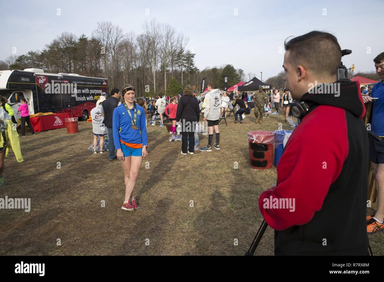 Ashley Spencer, the top female finisher, is interviewed after ...