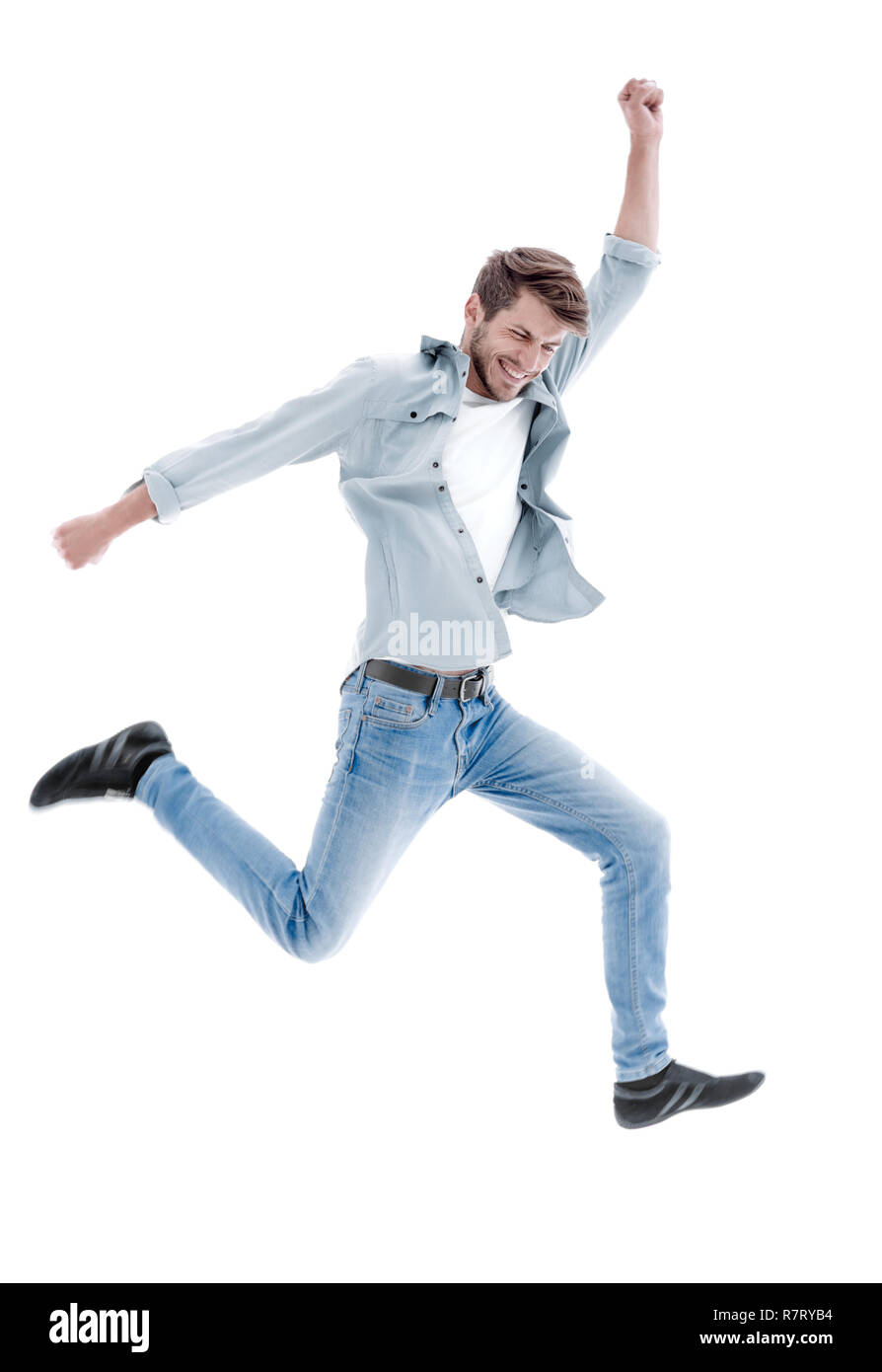 Happy man jumping in air over white background Stock Photo - Alamy