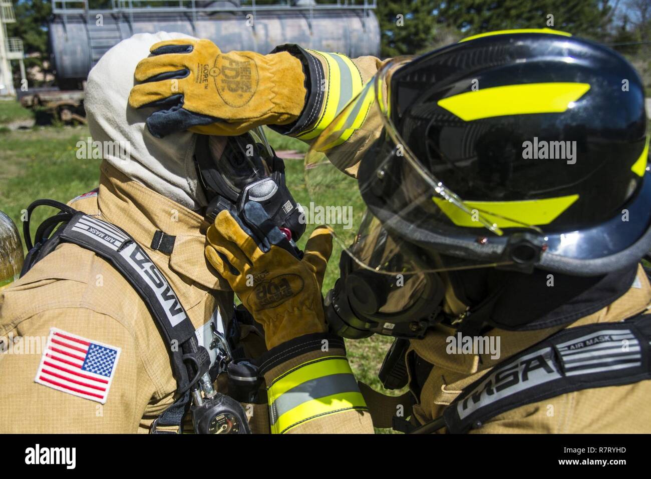 Firefighters with the 375th Civil Engineer Squadron perform drills in ...