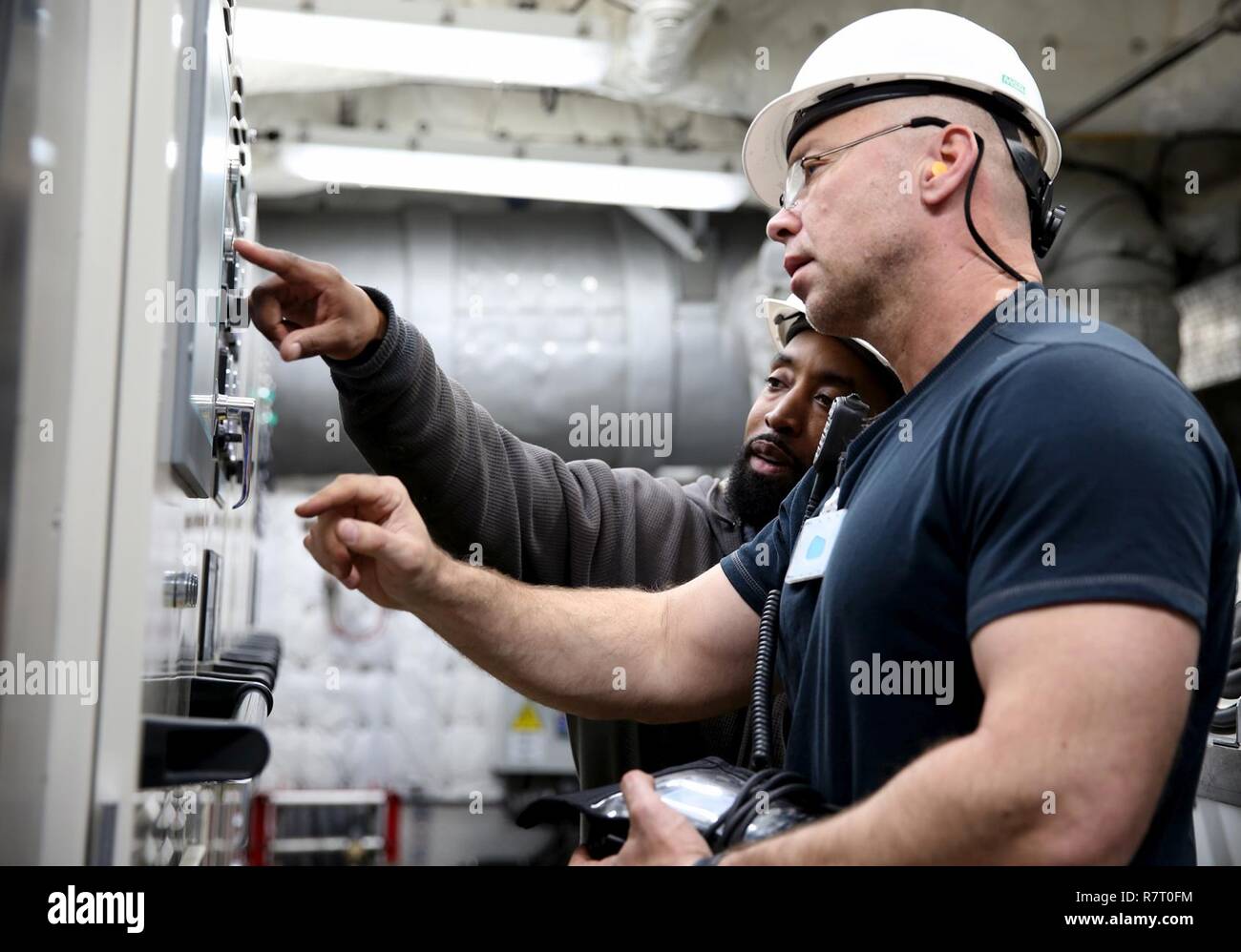 Morris Williams, USNS Trenton first engineer, and Sergey Amosov, USNS ...