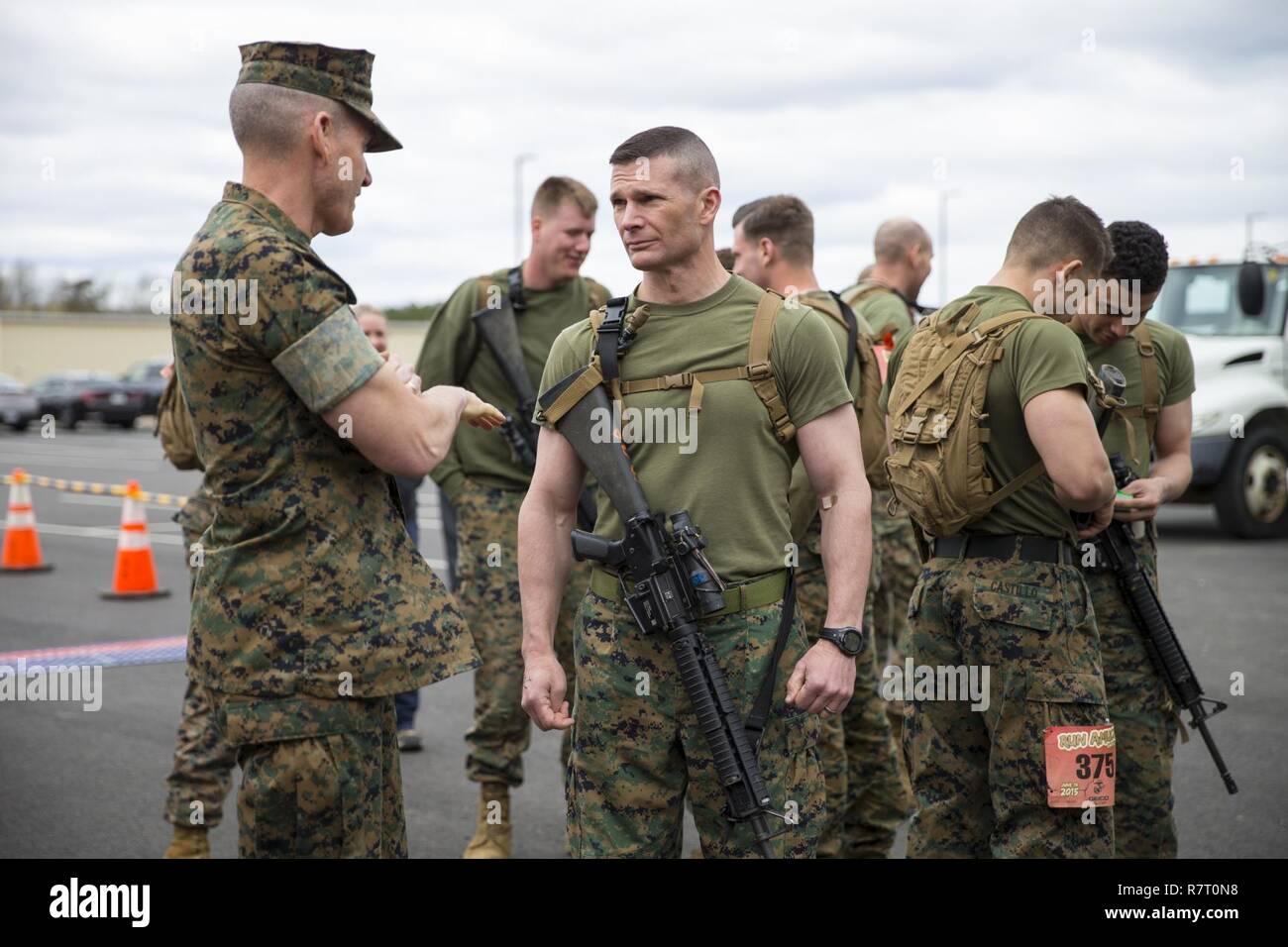 U.S. Marine Corps Brig. Gen. Jason Q. Bohm, left, commanding general ...
