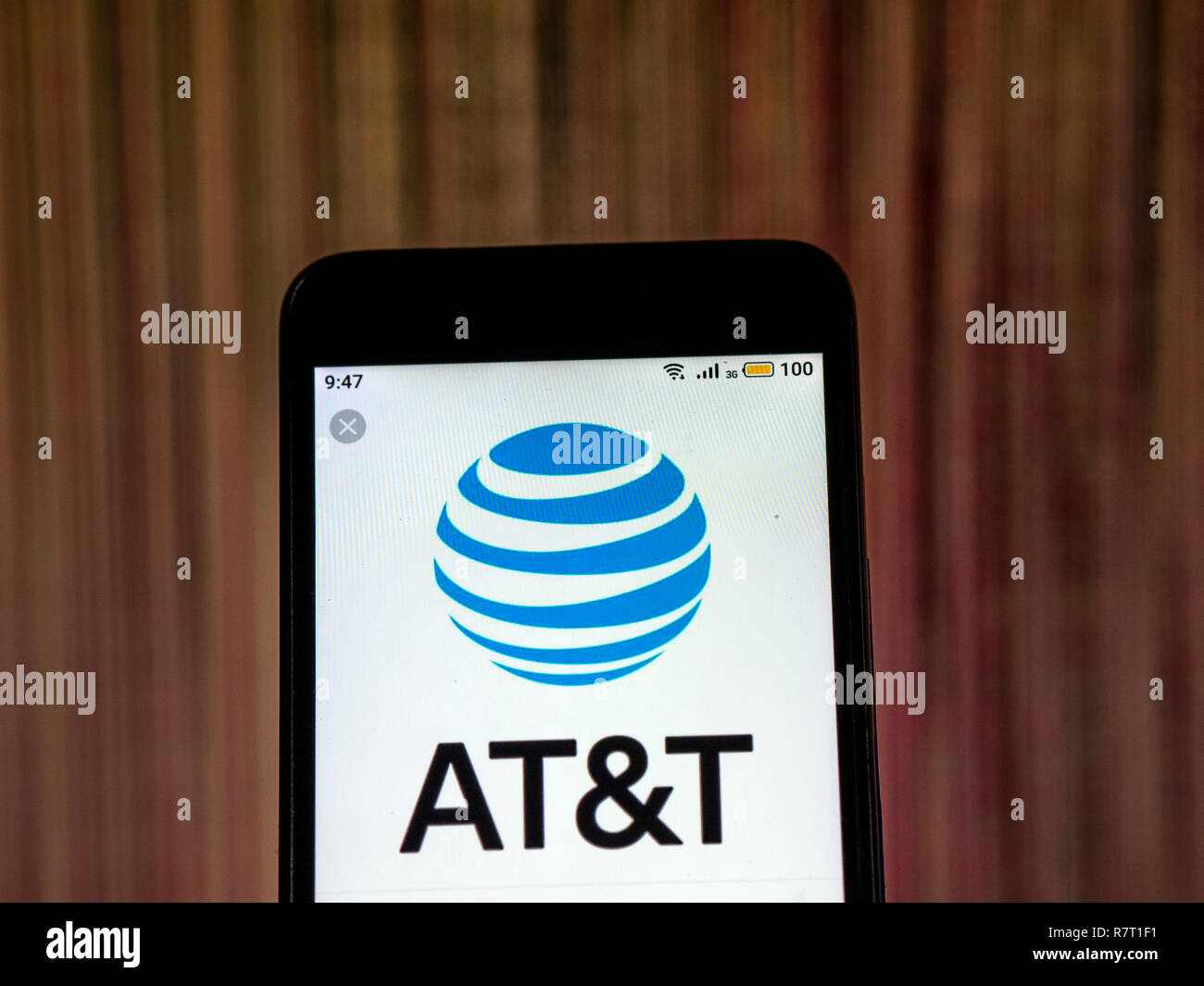 AT&T Telecommunications company logo seen displayed on smart phone ...