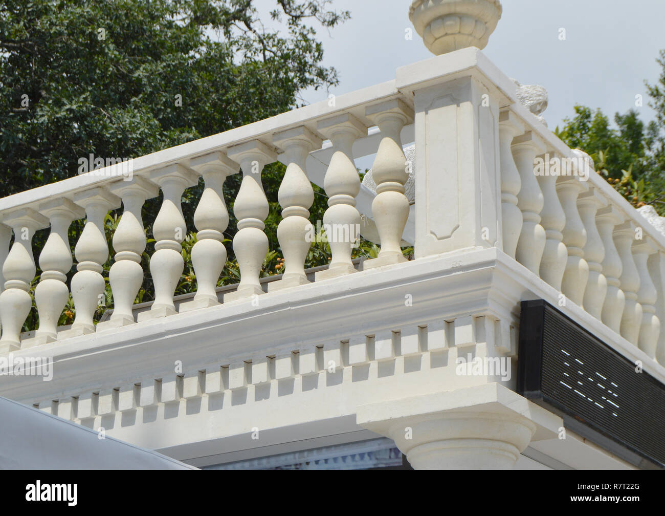 View of the romantic white balcony, terrace with balusters, white stone ...