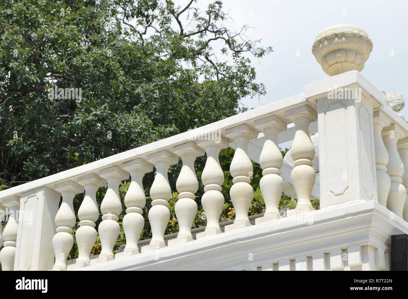 View of the romantic white balcony, terrace with balusters, white stone ...
