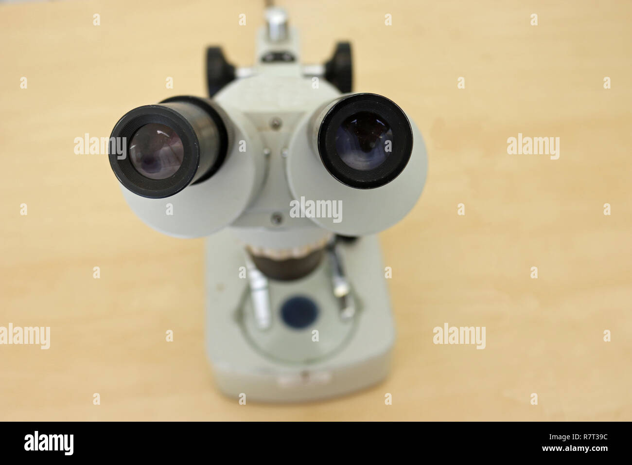 Binocular microscope with stand used for college teaching or laboratory ...