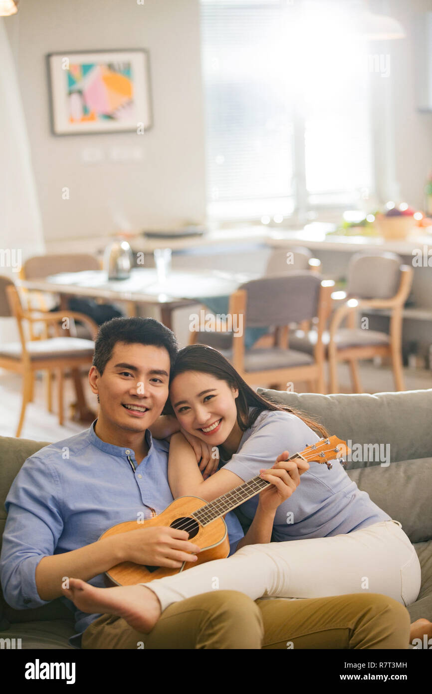 Romantic couples in the living room Stock Photo - Alamy