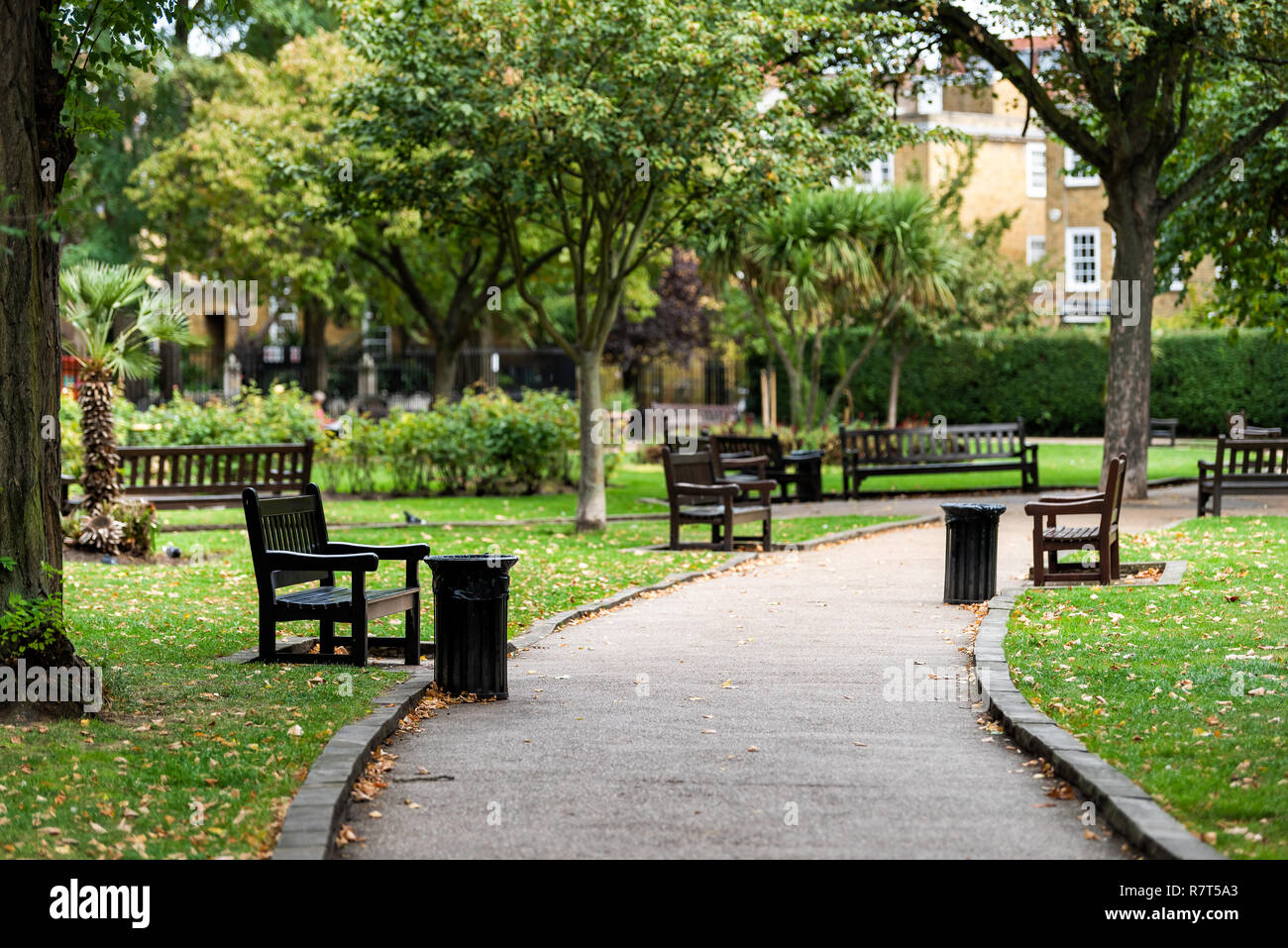 London, UK - September 16, 2018: Empty path in green St Luke's Gardens ...