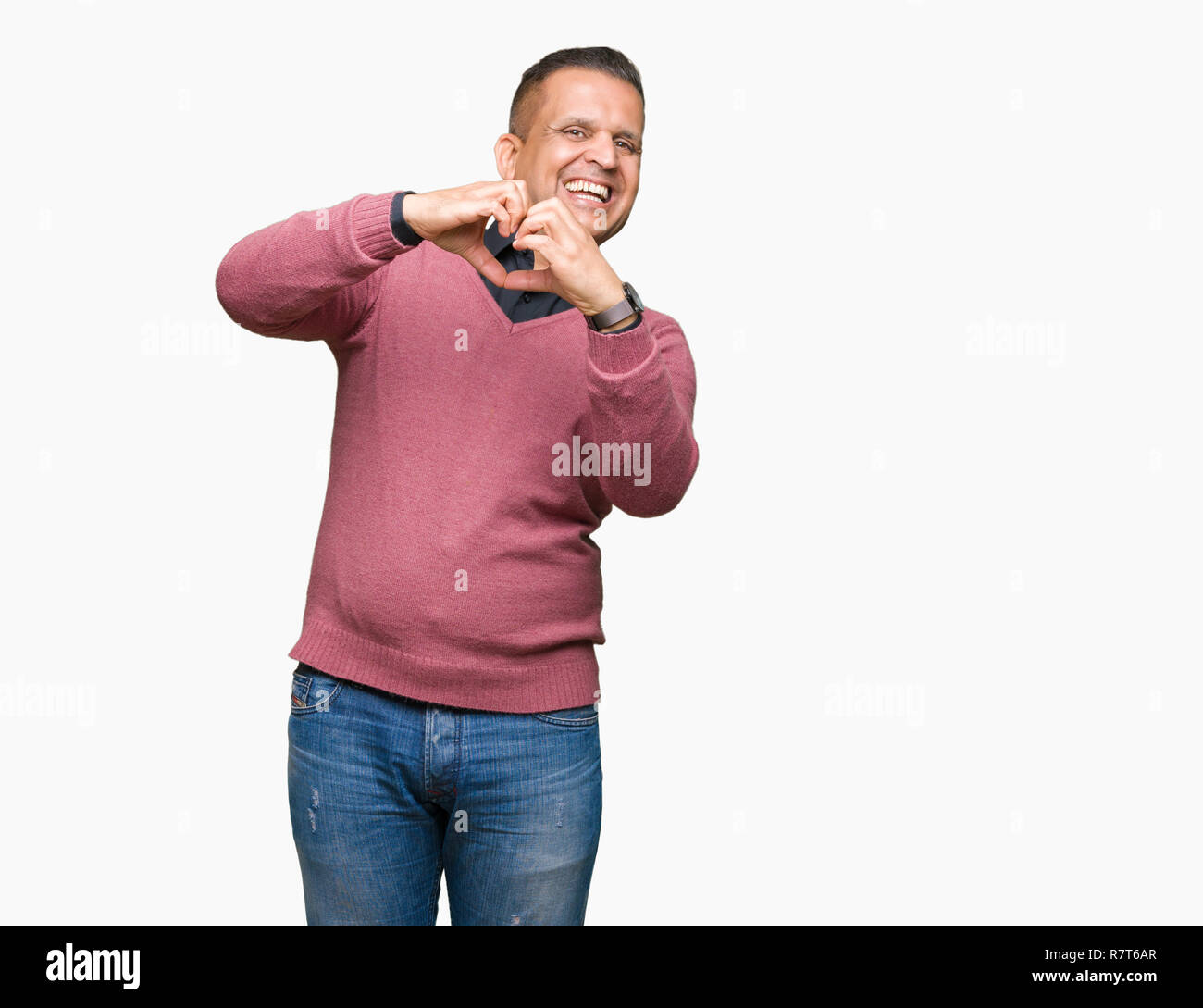 Middle age arab man over isolated background smiling in love showing ...