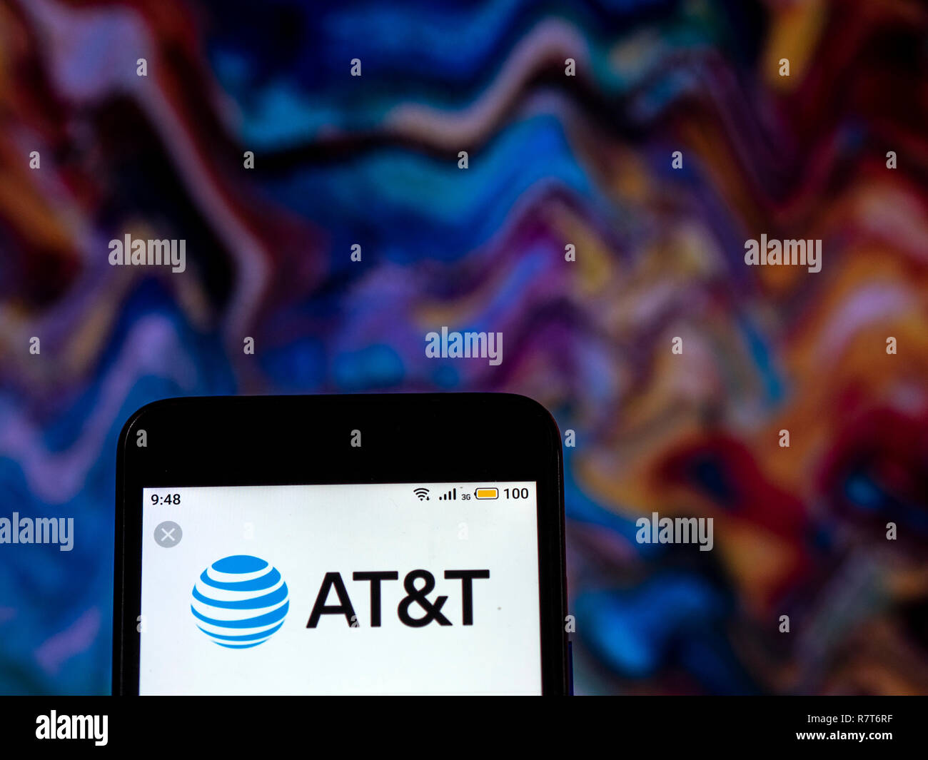 AT&T Telecommunications company logo seen displayed on smart phone ...