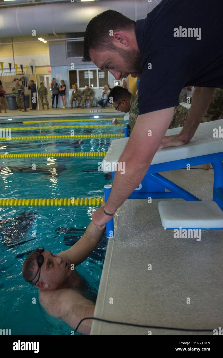 U.S. Army veteran Daniel Dudek, competes in the swimming event at the ...