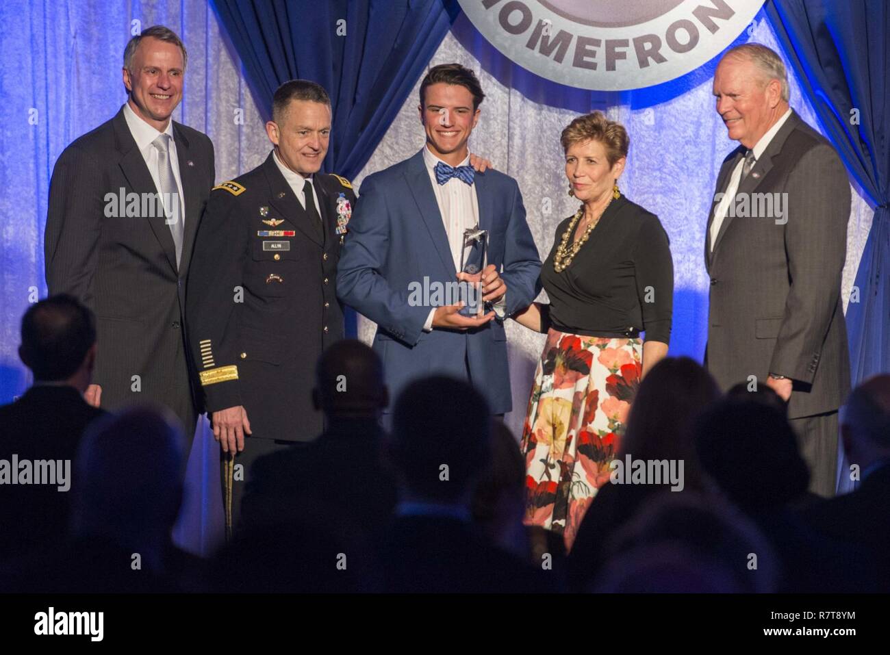 WASHINGTON- Henderson Heussner, center, poses for a group photo during ...