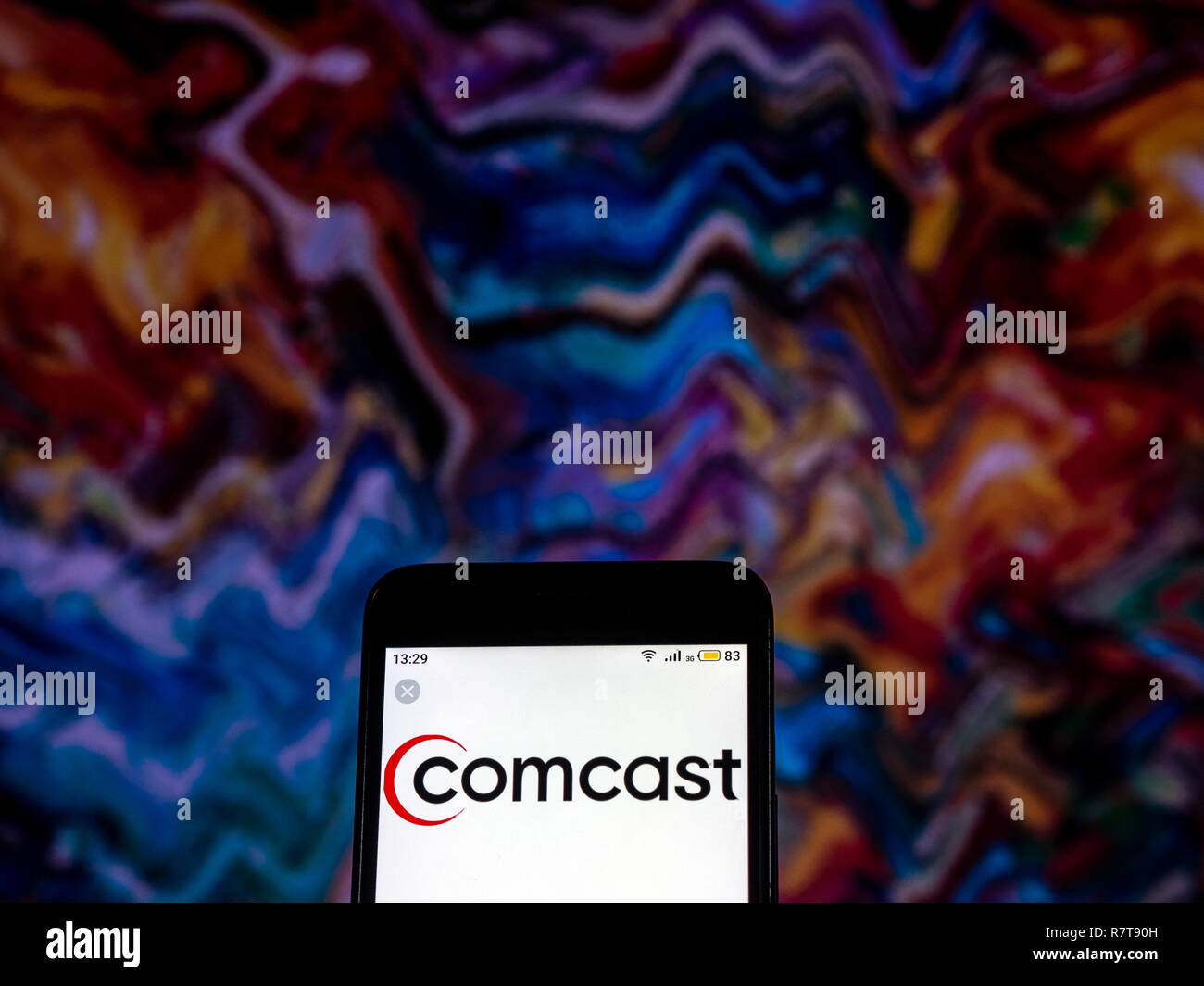 Comcast Telecommunications company logo seen displayed on smart phone ...