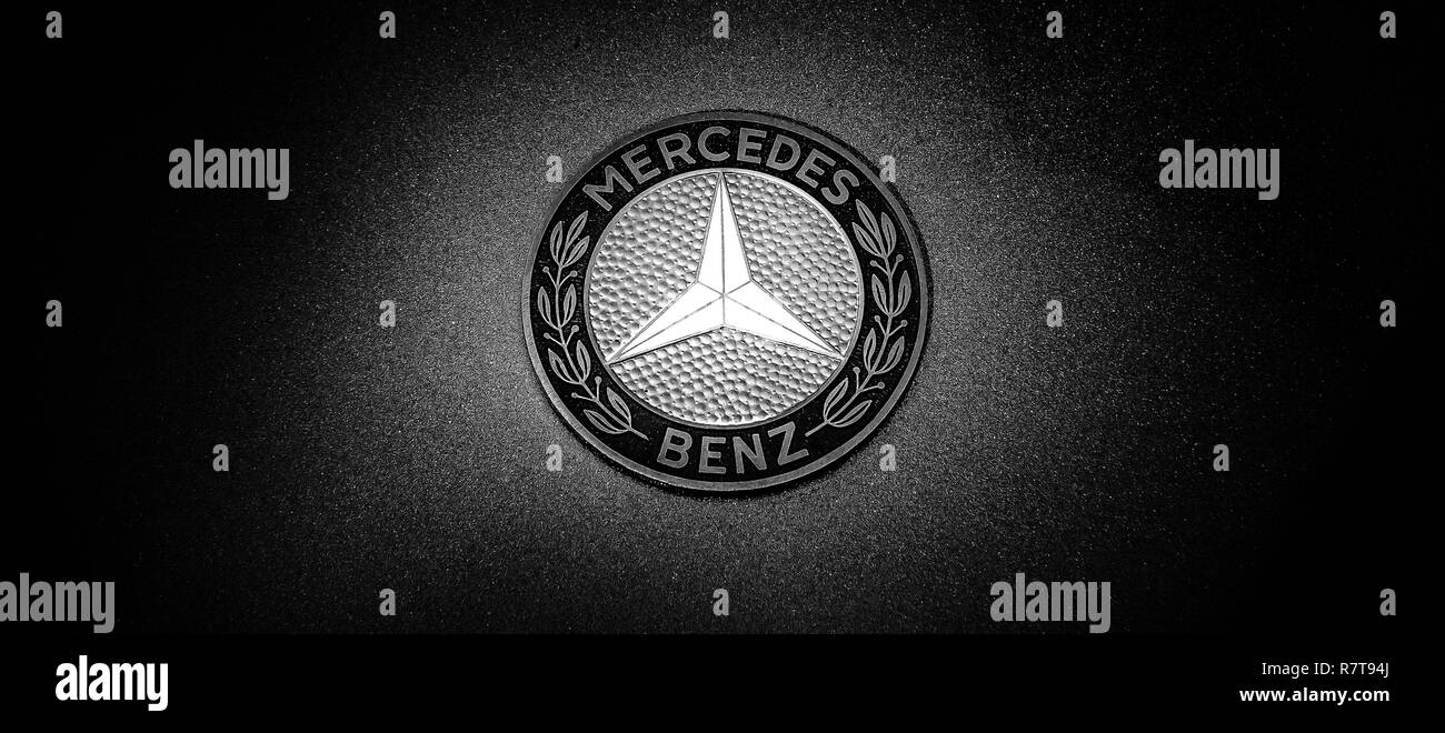 A black and white closeup of a Mercedes-Benz badge Stock Photo - Alamy