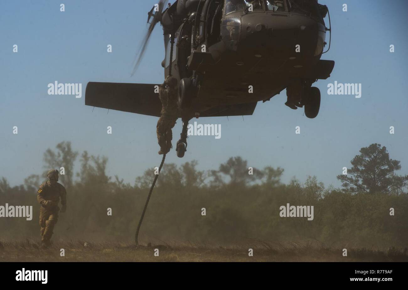 U.S. Army Rangers rappel out of a U.S. Army UH-60 Black Hawk during the ...
