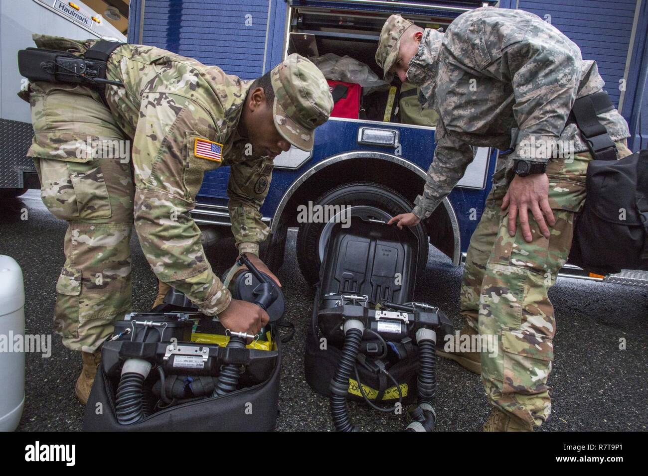 Survey team members Sgt. Quran Williams, left, and Staff Sgt. Nicky Lam ...