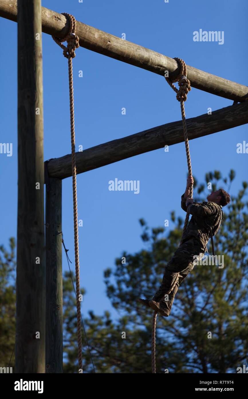 A U.S. Army Ranger performs a rope climb during the Best Ranger ...