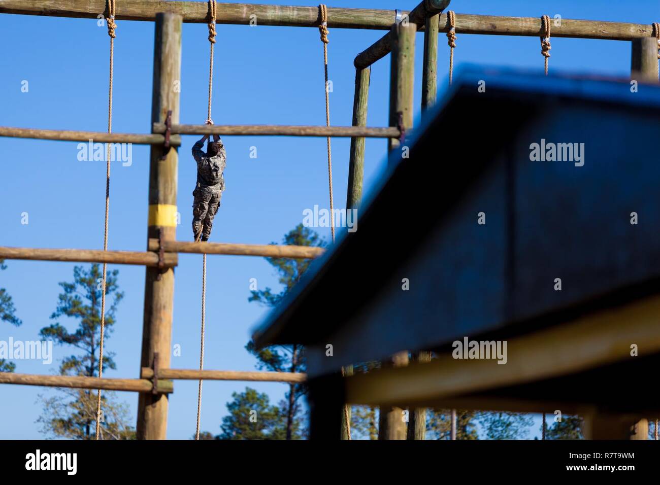 A U.S. Army Ranger, performs a rope climb during the Best Ranger ...