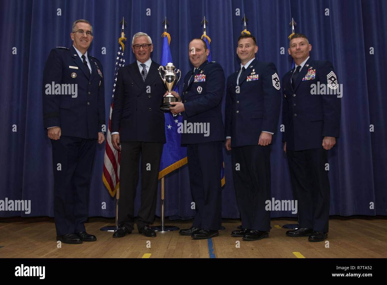PETERSON AIR FORCE BASE, Colo. –Col. Doug Schiess, 21st Space Wing commander, accepts the Omaha ...