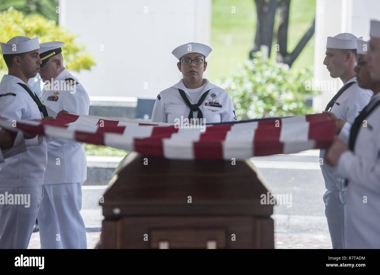 A ceremony is conducted to reinter Navy Seaman 1st Class Murry R ...