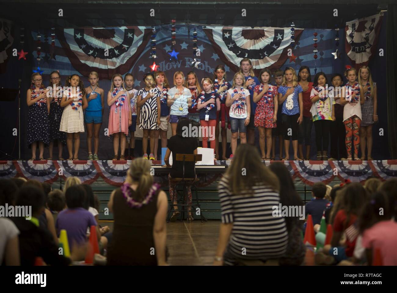 Students at Aikahi Elementary School pledge allegiance to the U.S. flag ...