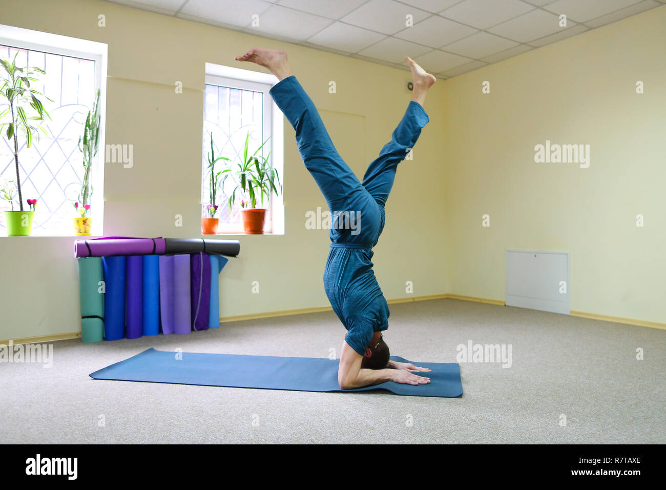 Beautiful young American performs asanas from yoga Stock Photo - Alamy