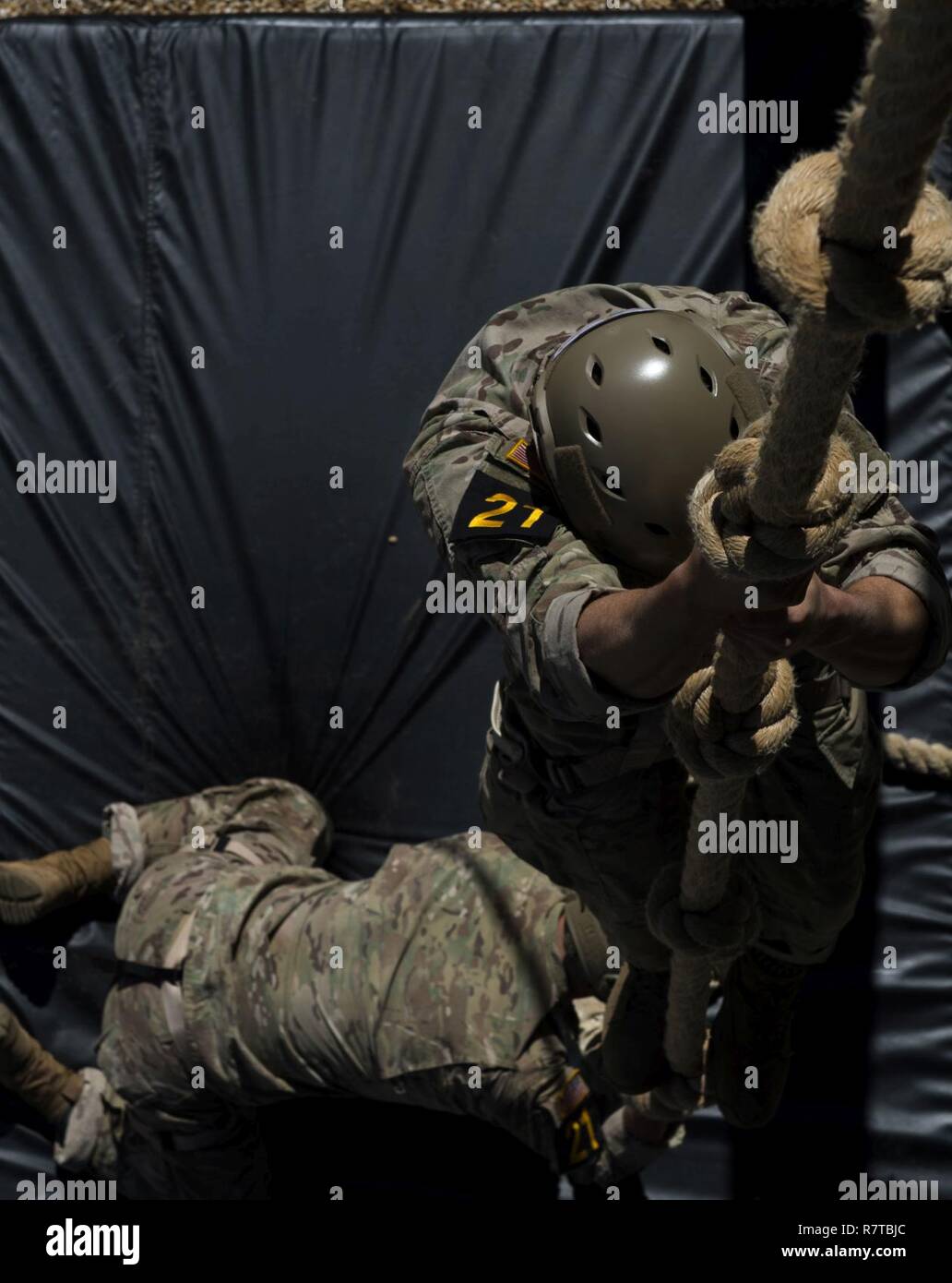U.S. Army Rangers from the 7th Infantry Division climb a rope at an ...
