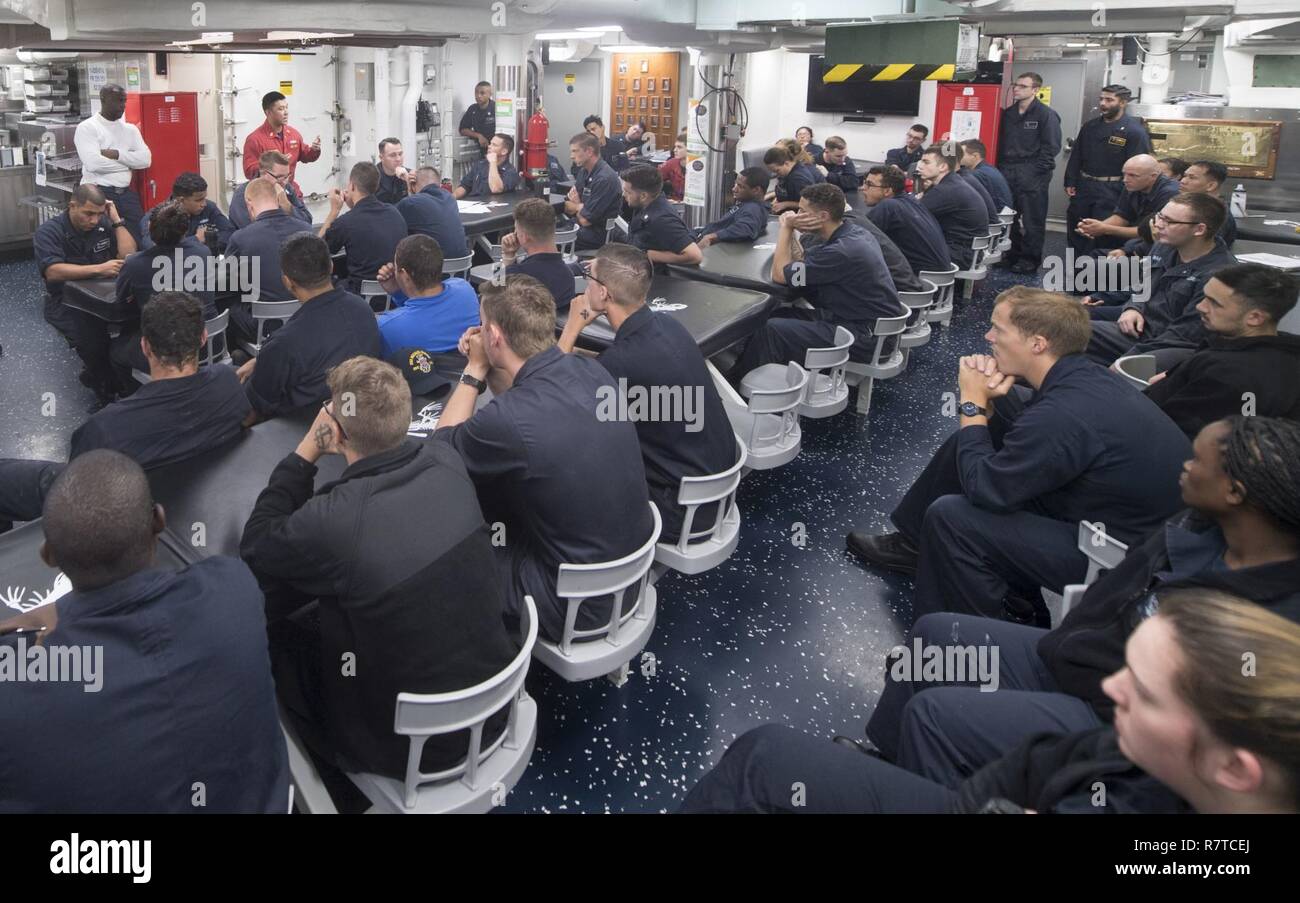 SOUTH CHINA SEA (March 27, 2017) Sailors gather on the mess decks for a ...