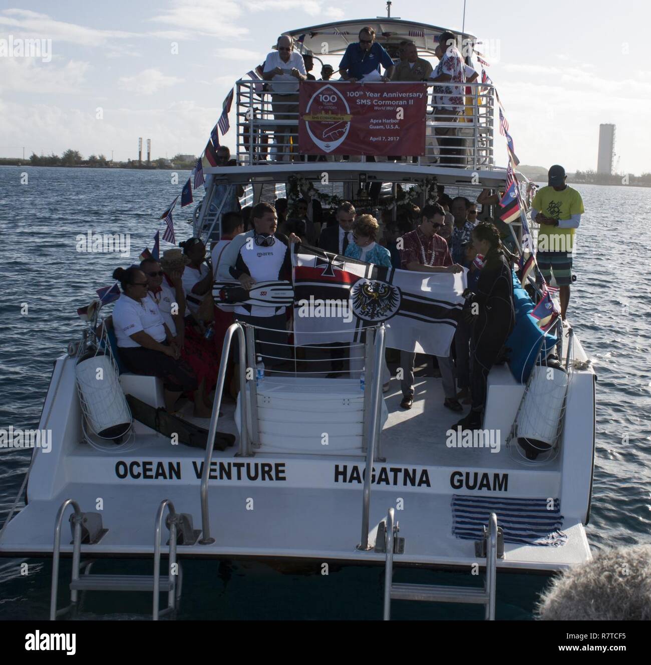 APRA HARBOR, Guam (April 7, 2017) – Divers prepare to take a wreath ...