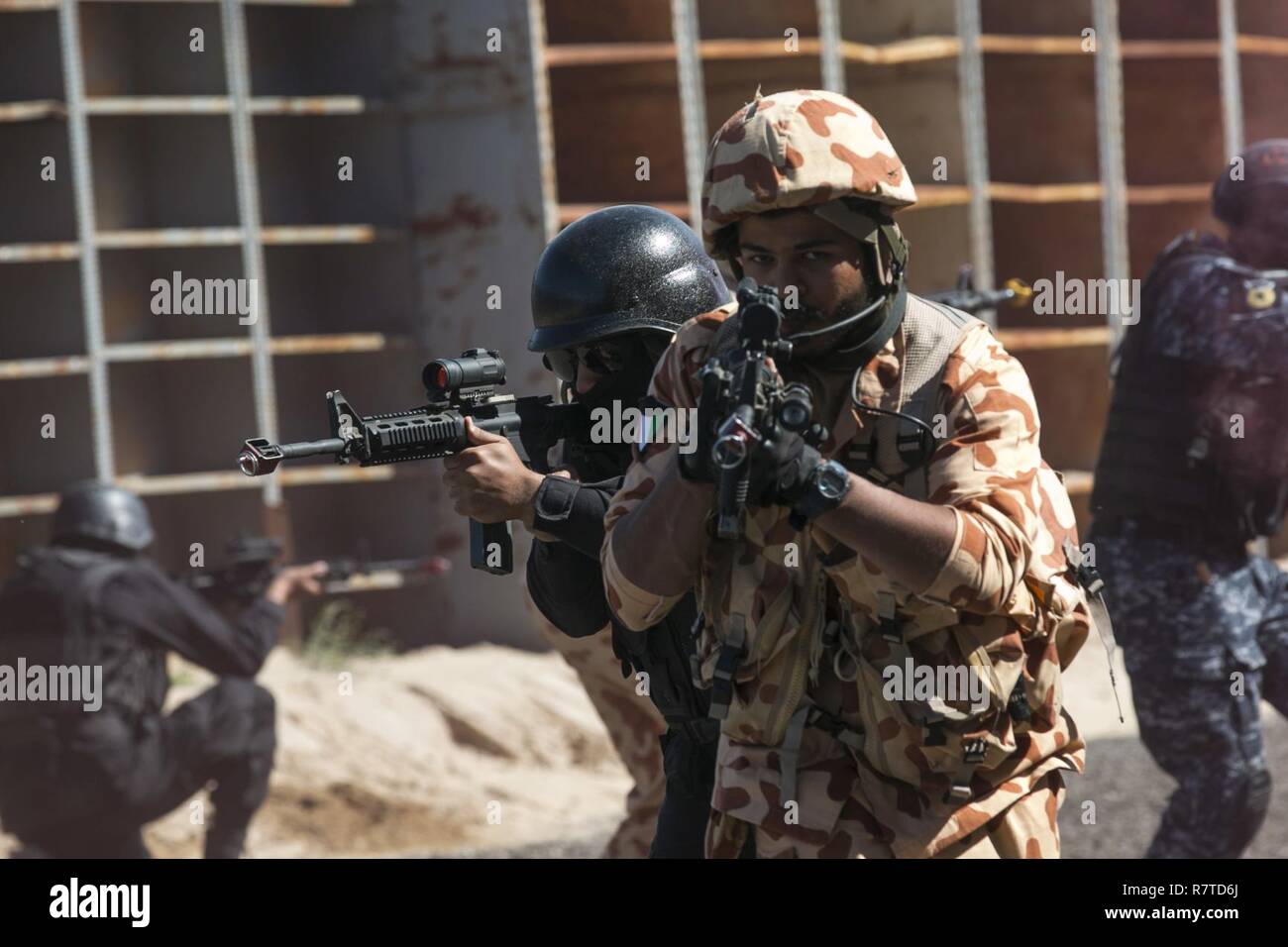 A Kuwaiti special operations soldier prepares to clear a warehouse ...