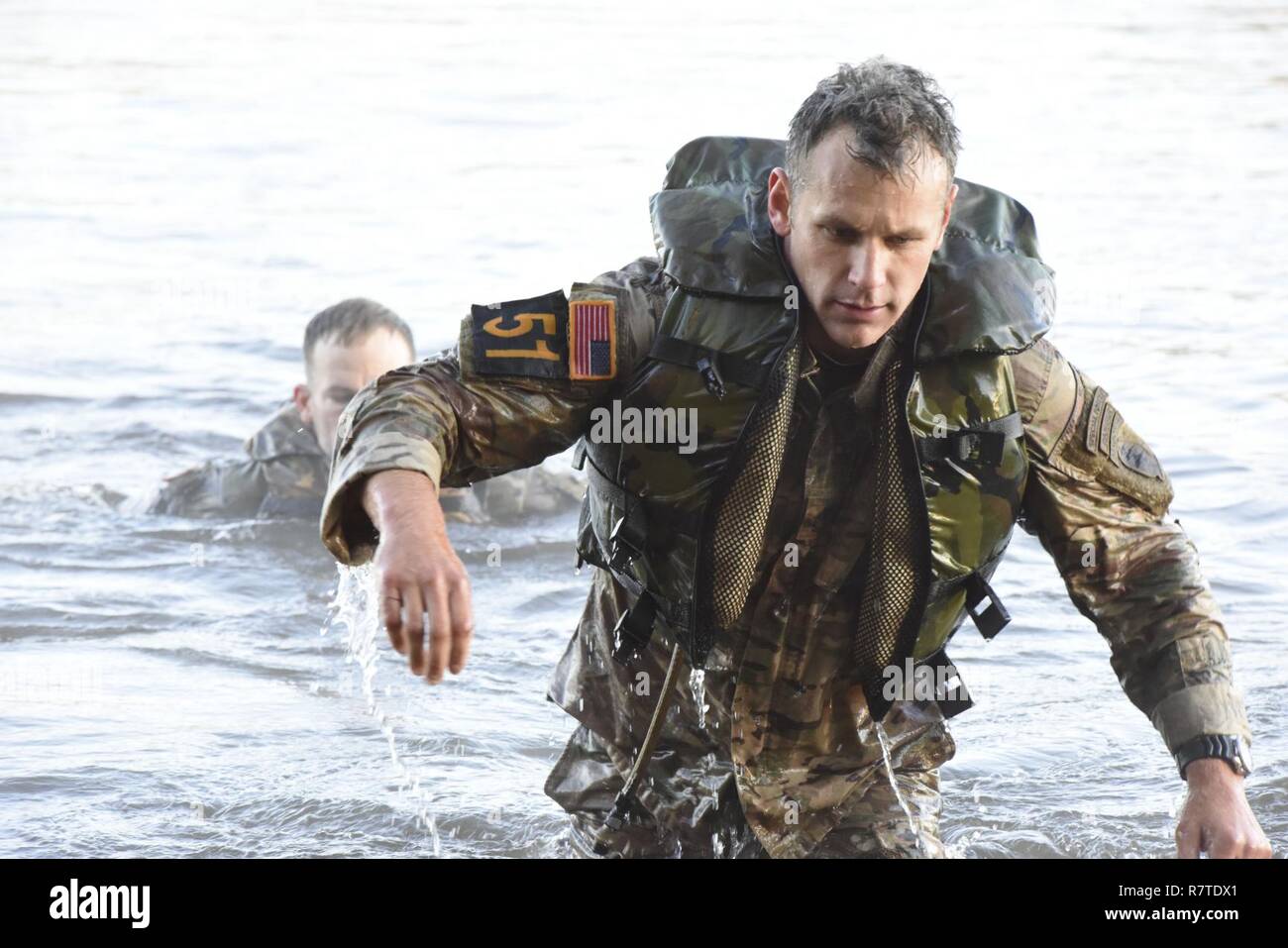 Sgt. 1st Class Jesse Volk, of the Texas Army National Guard, makes his ...