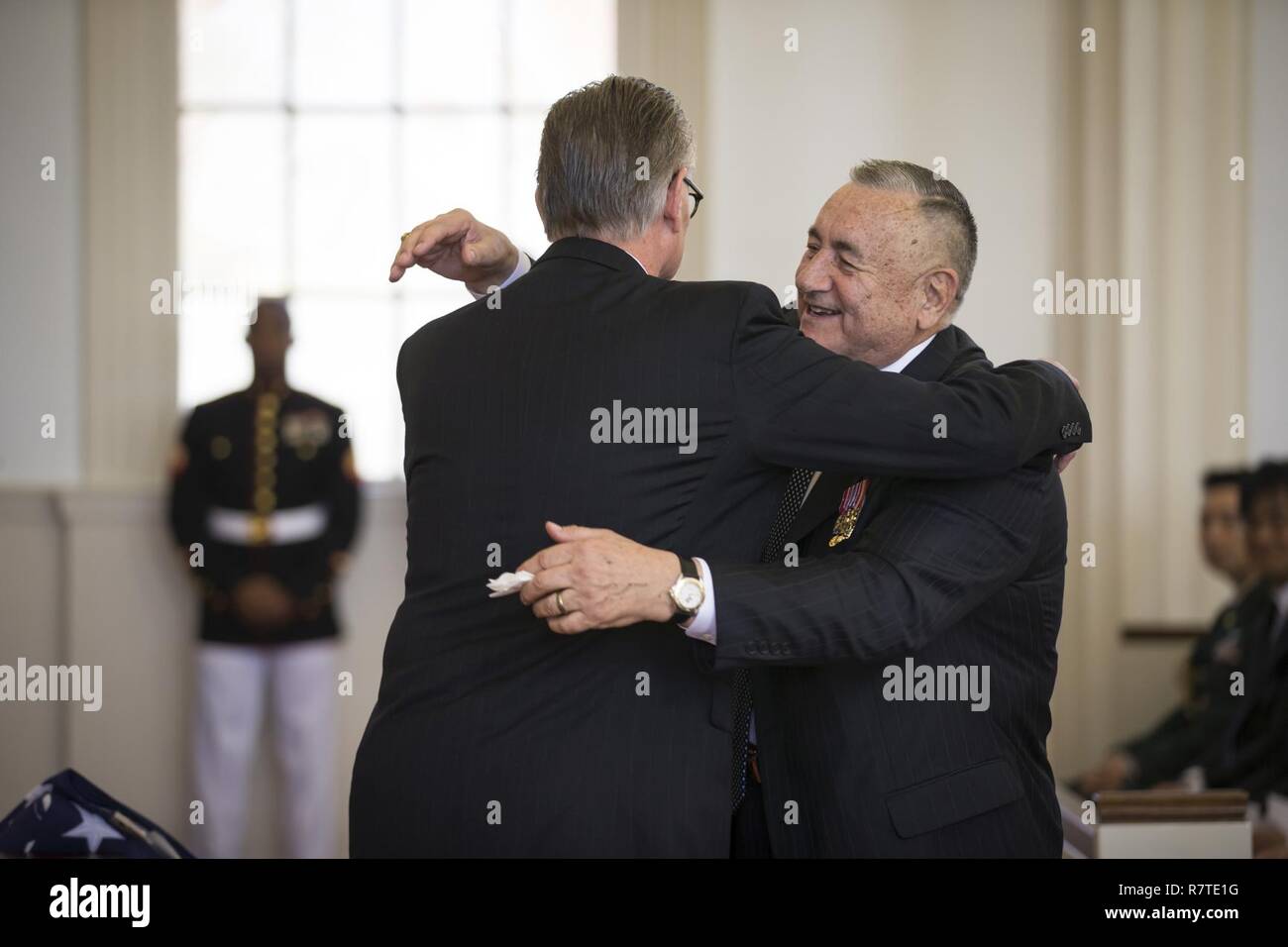 Retired U.S. Marine Corps Lt. Col. John S. Snowden hugs his brother ...