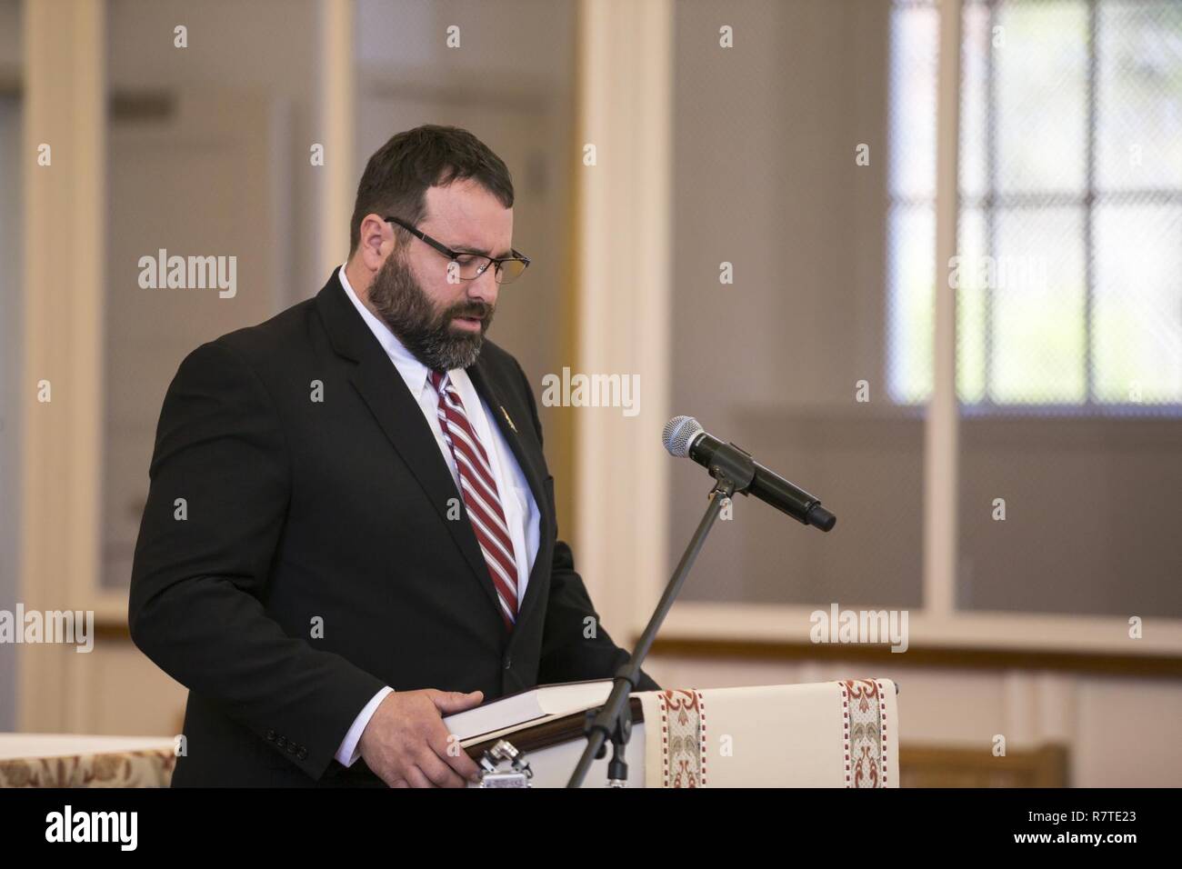 Jeffrey S. Snowden gives the benidiction during a memorial service held ...