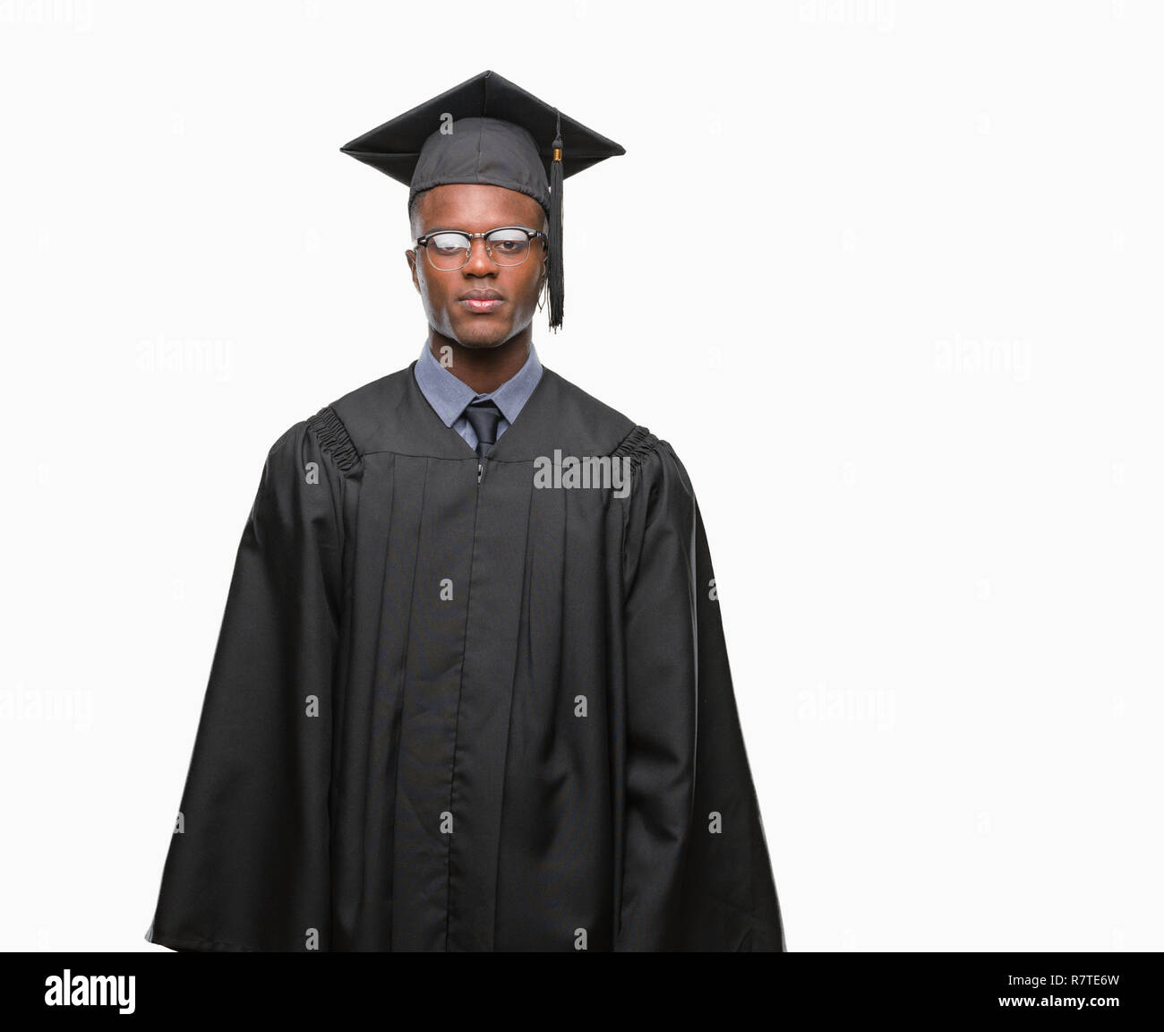 Young graduated african american man over isolated background with ...