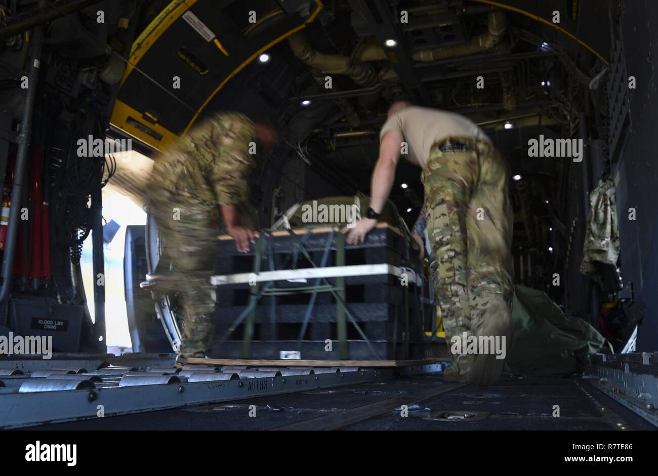 Loadmasters with the 15th Special Operations Squadron transport a ...