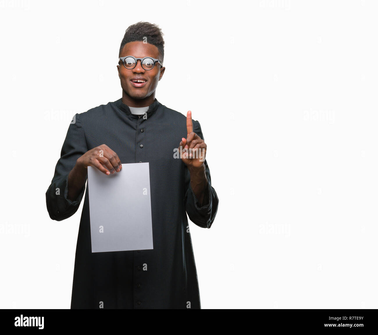 Young african american priest man over isolated background holding ...