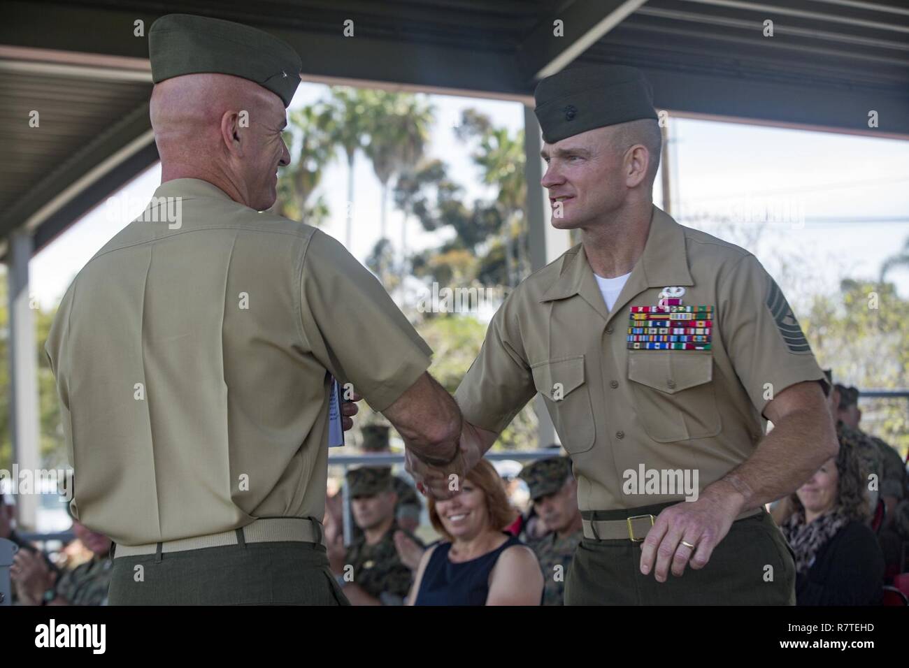 U.S. Marine Sgt. Maj. Troy E. Black shakes hands with Brig. Gen. David ...