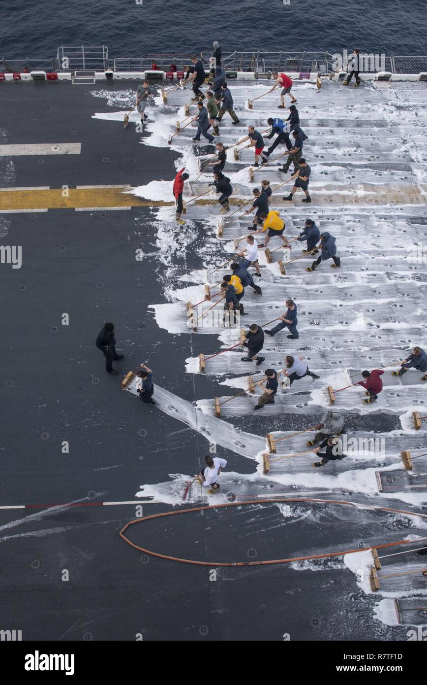 SEA OF JAPAN (April 9, 2017) Air department Sailors scrub the flight ...